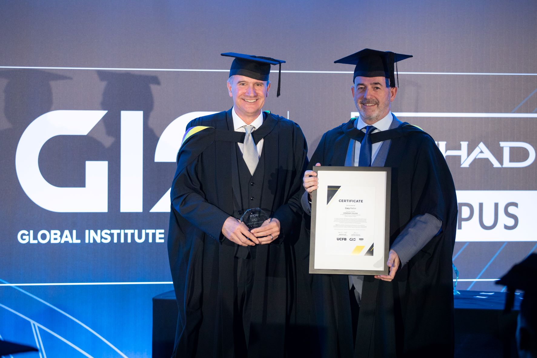 Gary Mellor receives honorary fellowship from UCFB & GIS - Beswicks Sports